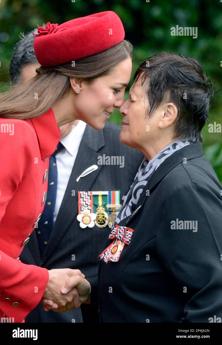 Britain's Kate, the Duchess of Cambridge, left, receives a hongi, a ...