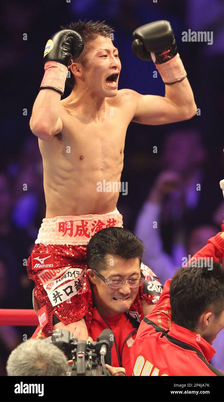 Japan's Naoya Inoue (top) celebrates after beating WBC light flyweight ...
