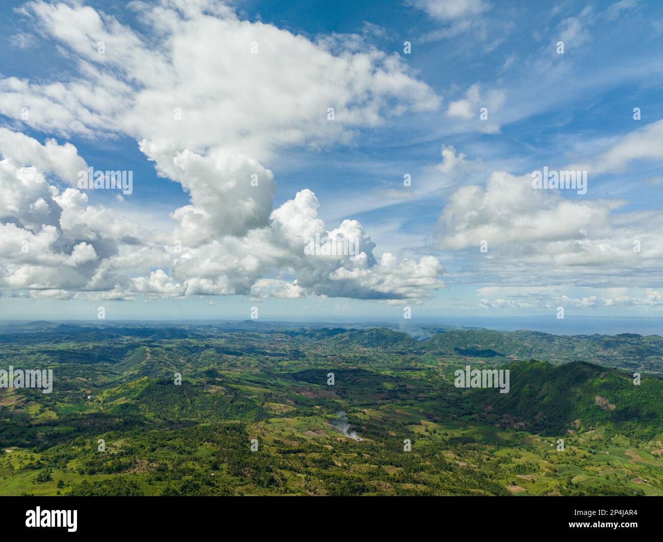 Top view of farmland on the slopes of hills in the mountainous region ...