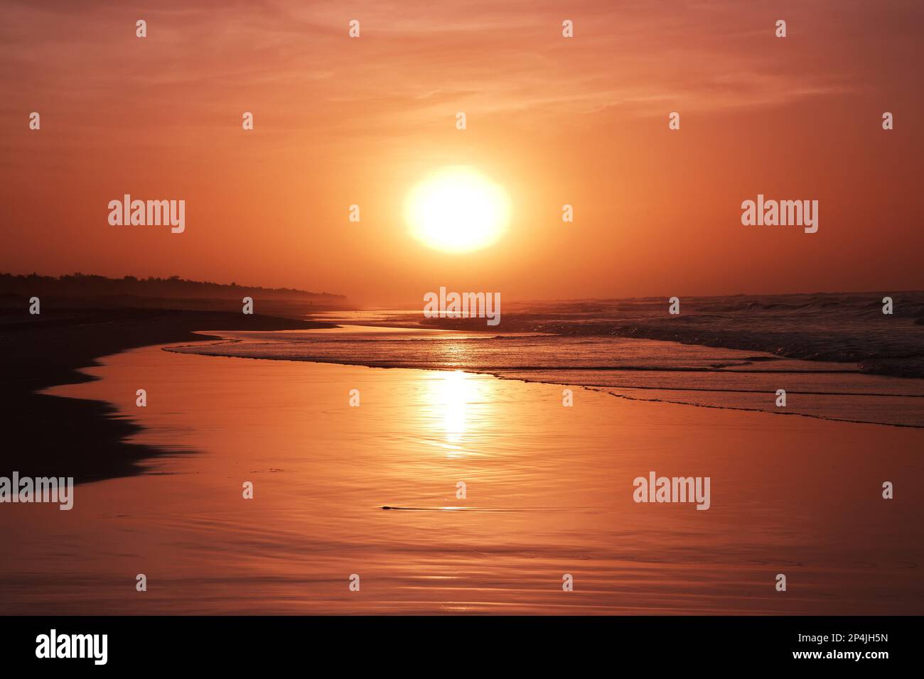 Sunset of Atlantic ocean, close Lake Rose, Senegal, West Africa Stock ...