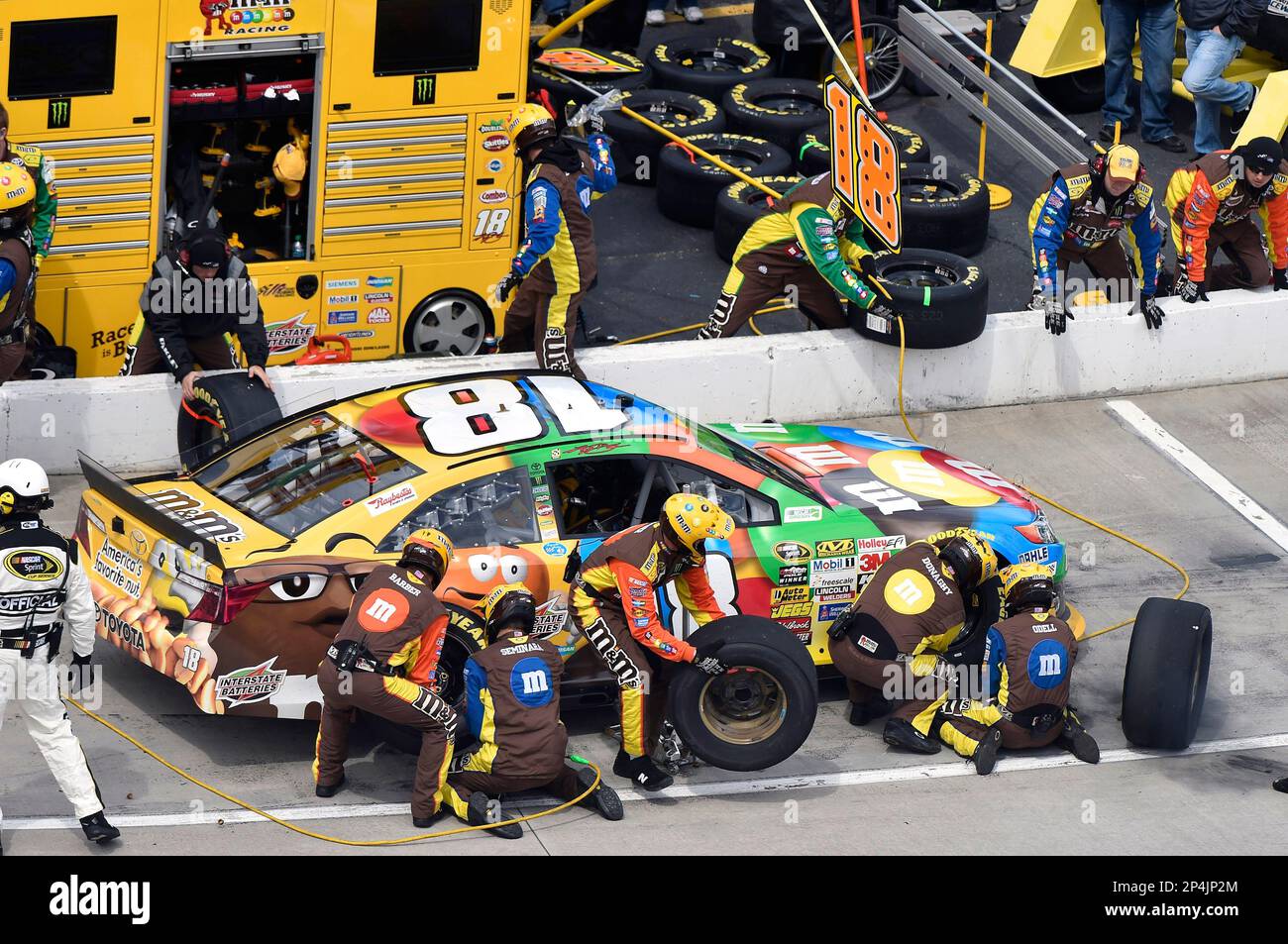 Kyle Busch (18) pit stop during the NASCAR Sprint Cup Series STP 500 ...