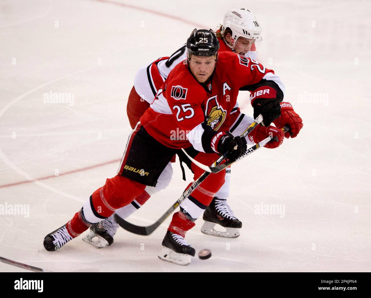Ottawa Senators right wing Chris Neil stick handles the puck away from ...