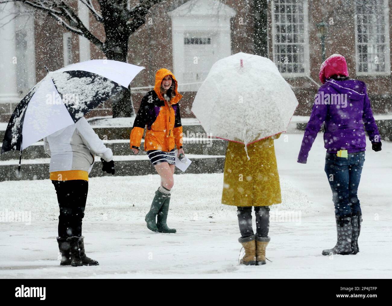 McDaniel College freshman Madeline Rose, second from left, pauses to ...