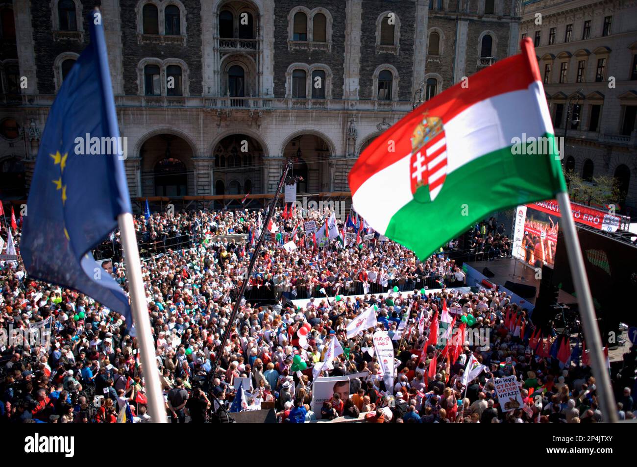 Supporters of the oppositional five-party coalition attend the election ...