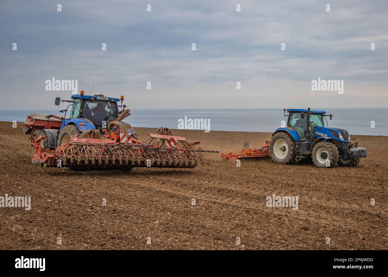 Martin O'Regan sowing spring oats near Kinsale, Co. Cork, March '23 ...