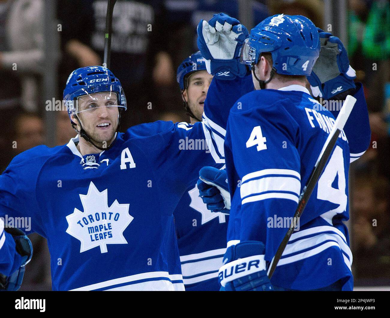 Toronto Maple Leafs defenseman Cody Franson, right, is congratulated by ...