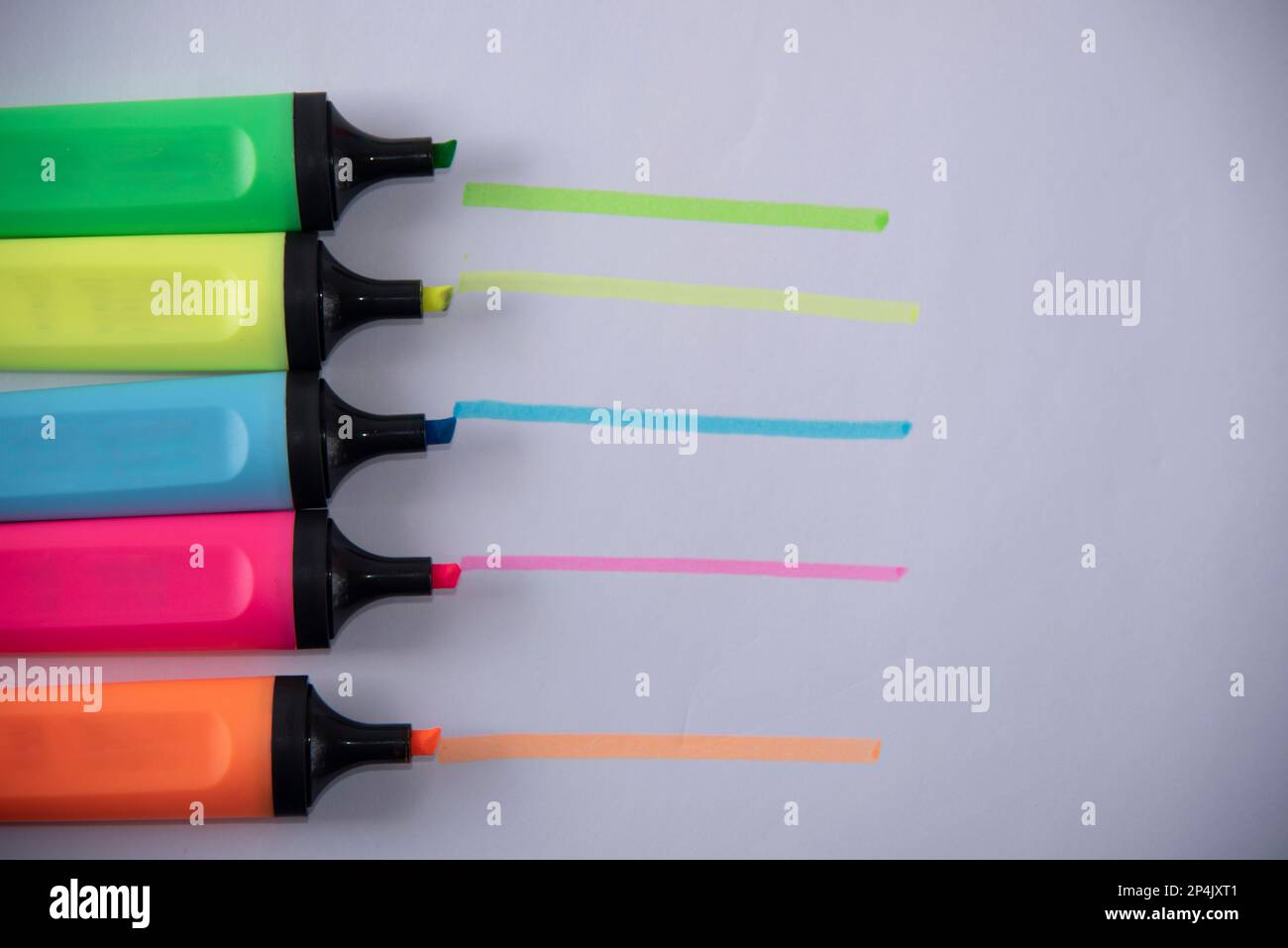 colored markers on the white background Stock Photo - Alamy