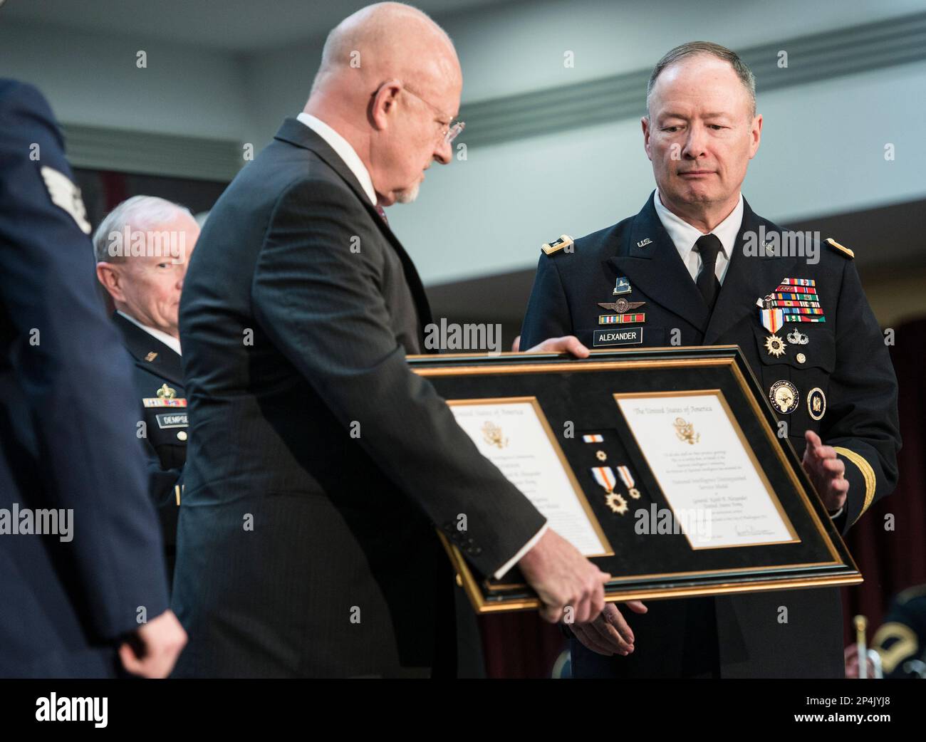 Director of National Intelligence James R. Clapper, left, awards Gen ...