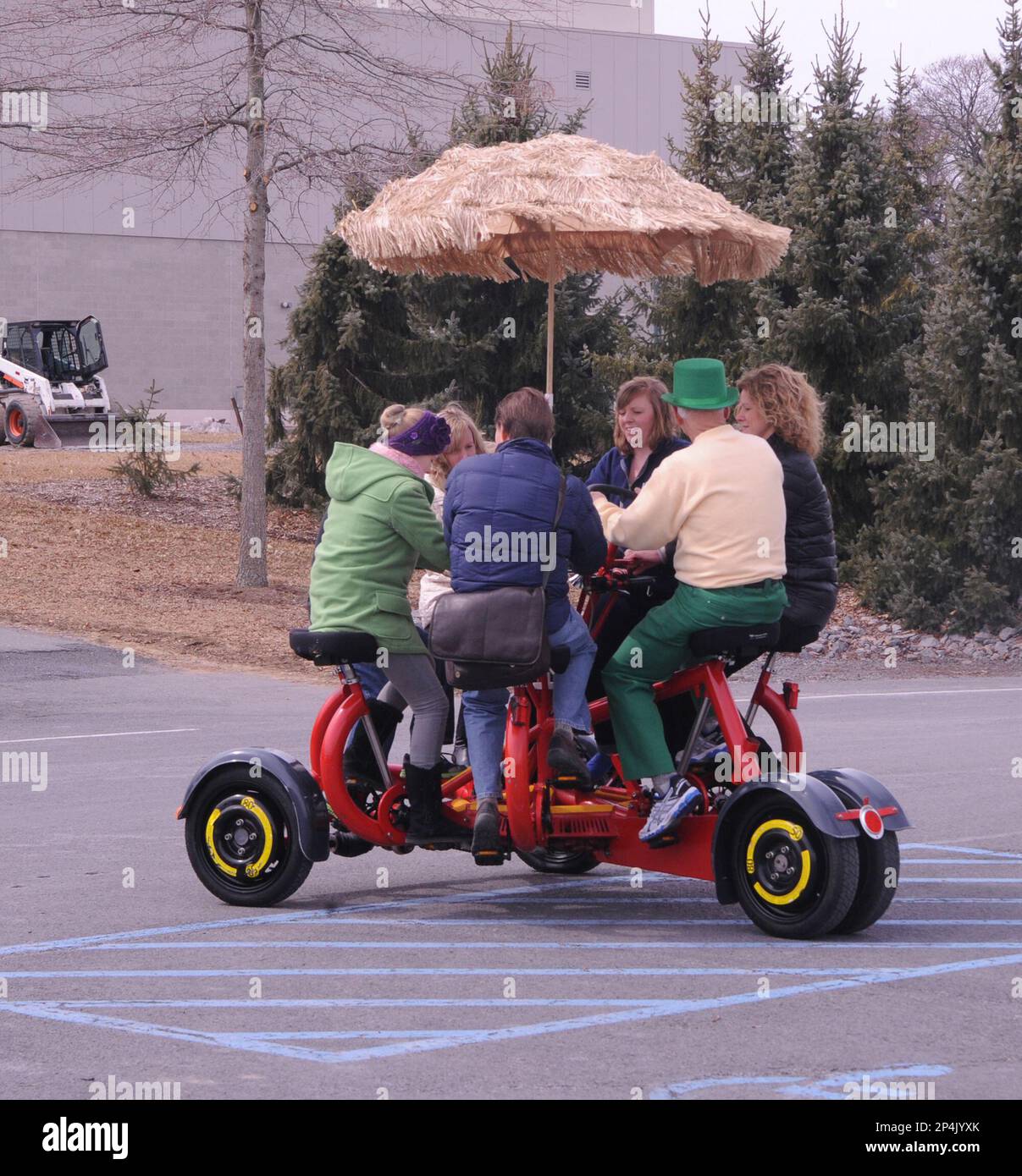 Bob "The Bike Guy" Swain rides his seven person Conference Bike with ...