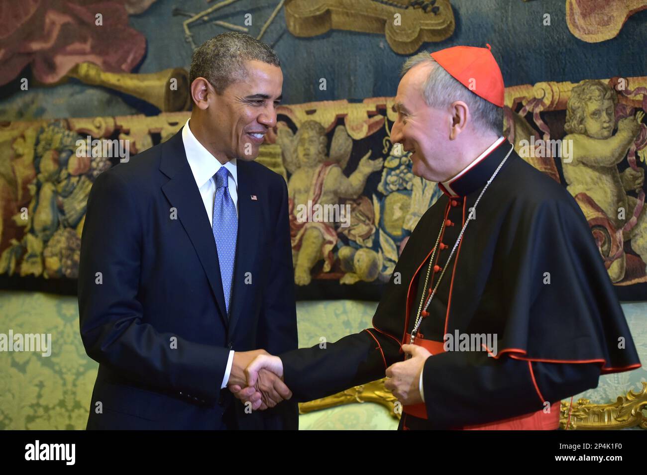 Vatican secretary of state Cardinal Pietro Parolin shakes hands with ...