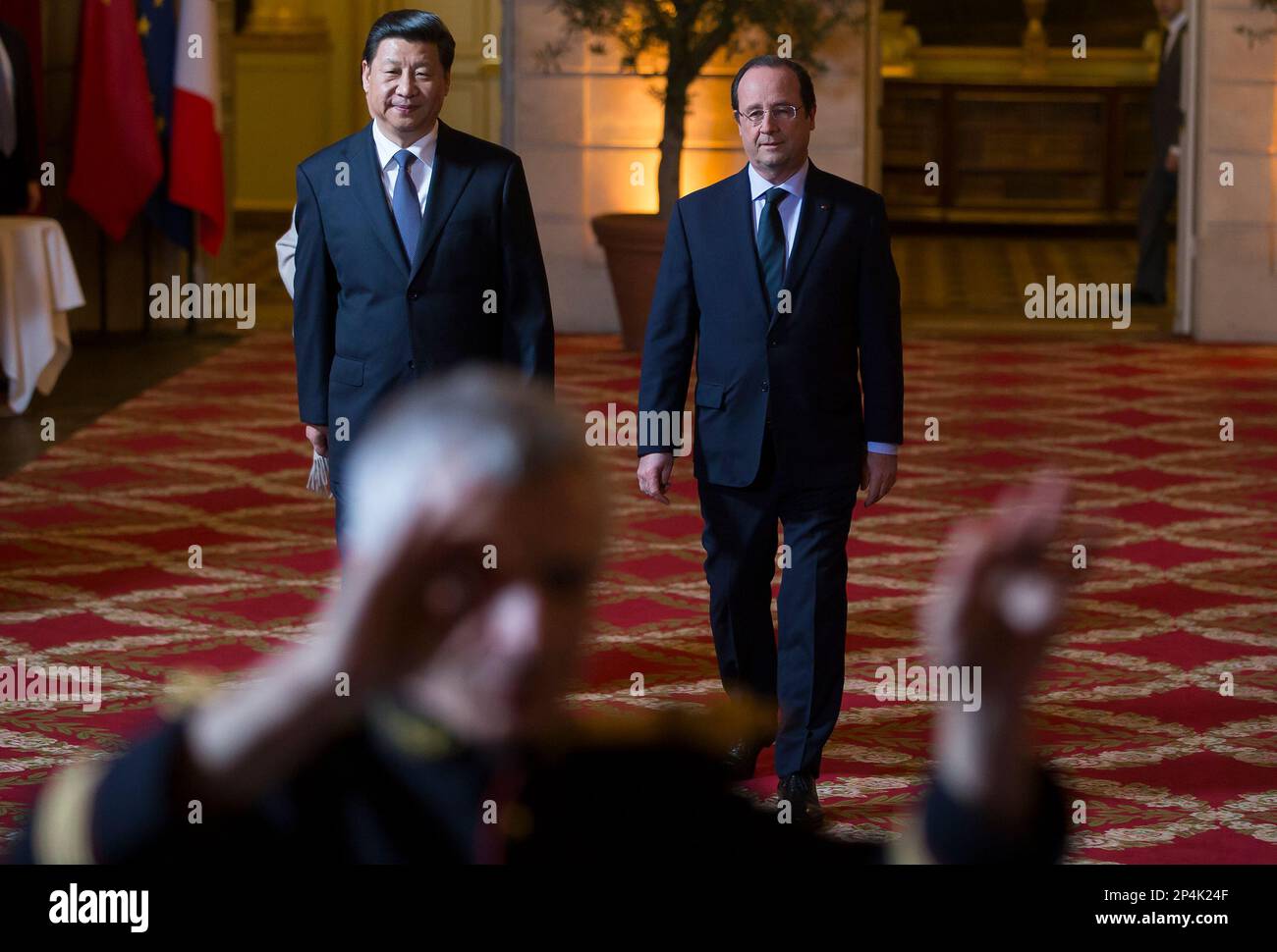 French president Francois Hollande, center, and Chinese President Xi ...