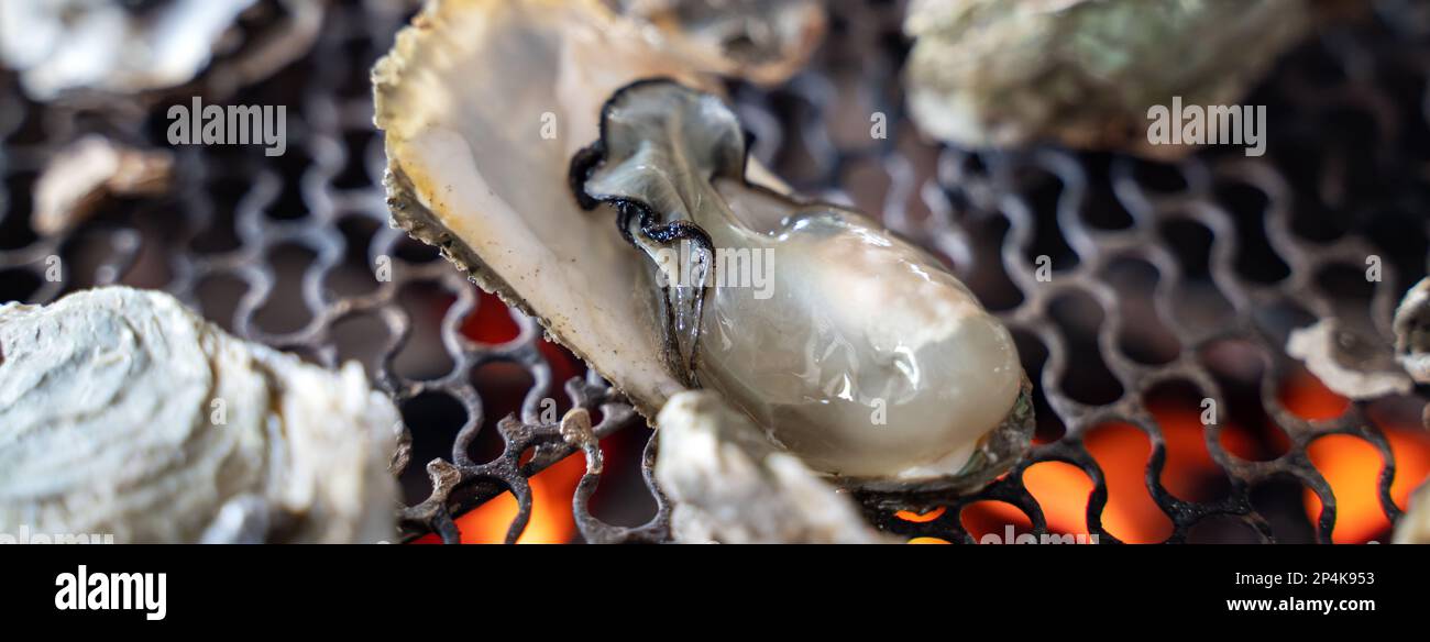 Grilled fresh oyster in Tainan, Taiwan, the famous Taiwanese street ...