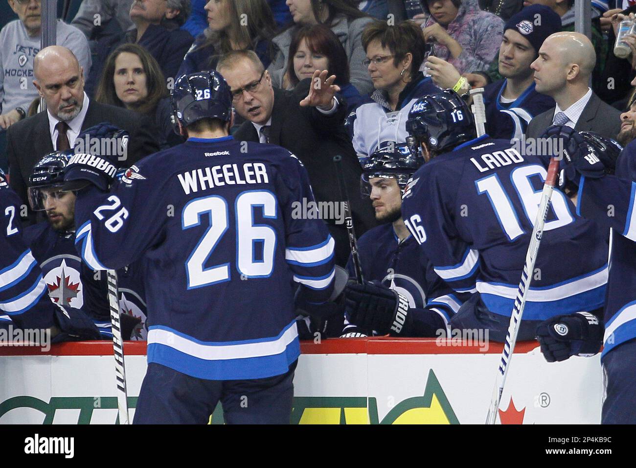 Winnipeg Jets coach Paul Maurice talks to his players during the second ...