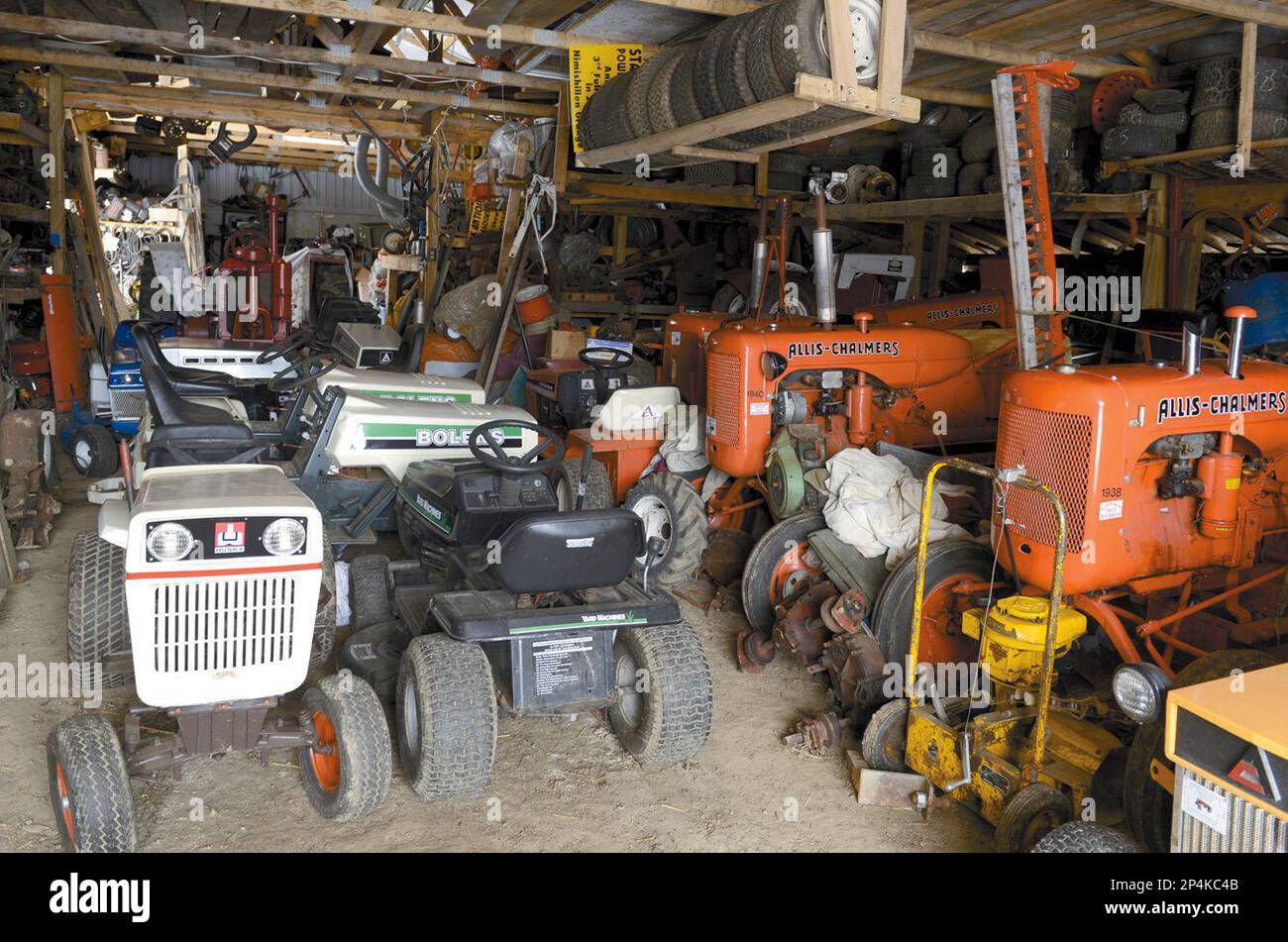 This March 5, 2014 photo shows a collection of restored lawn mowers ...