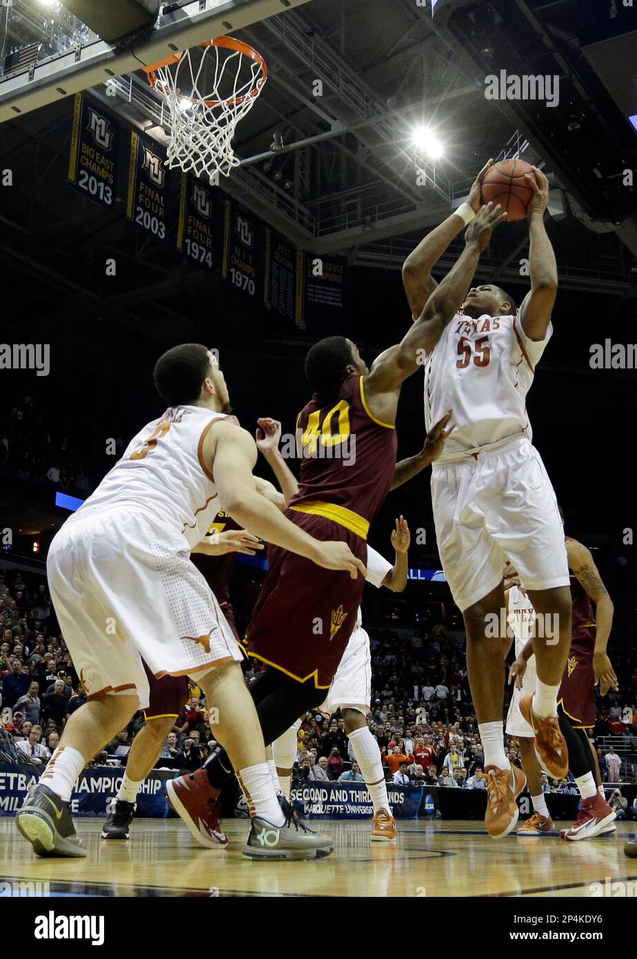 Texas center Cameron Ridley (55) goes up for the game winning shot ...