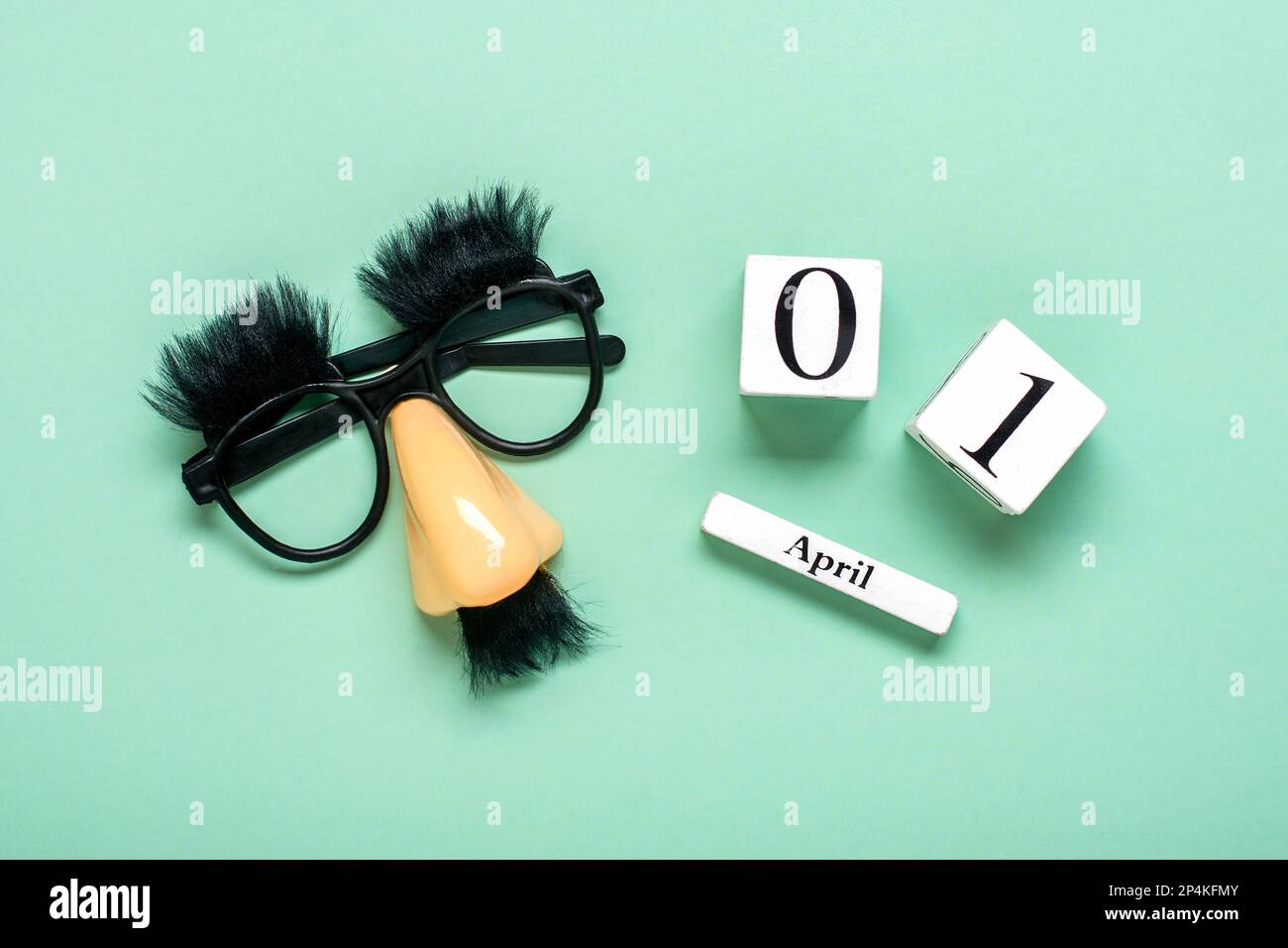 funny face - fake eyeglasses, nose and mustache, calendar with date 01 ...