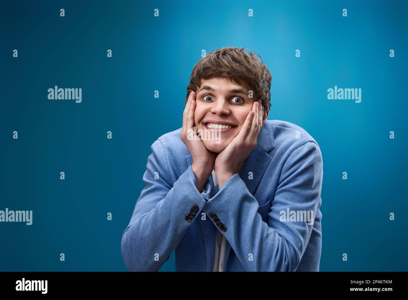shocked man with surprise expression and excited face Stock Photo - Alamy