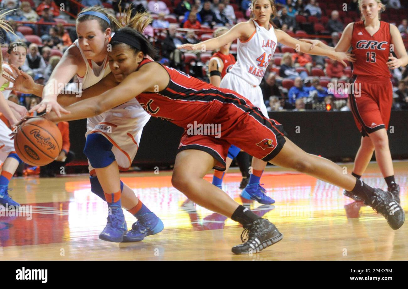 Marshall County's Hannah Langhi (42) fights for possession with George ...