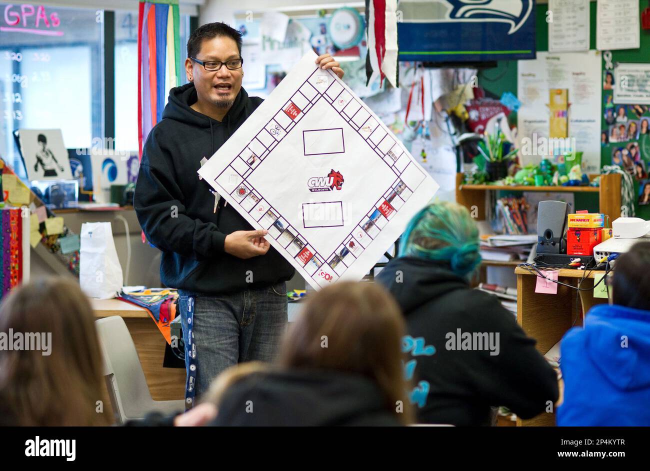 AVID/Cultural Leadership teacher Randy Quinto shows an example of a ...