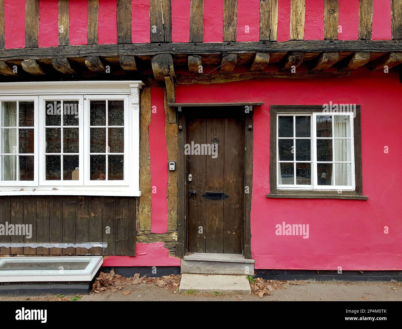 Facade of a pink cottage in Saffron Walden, Essex Stock Photo - Alamy