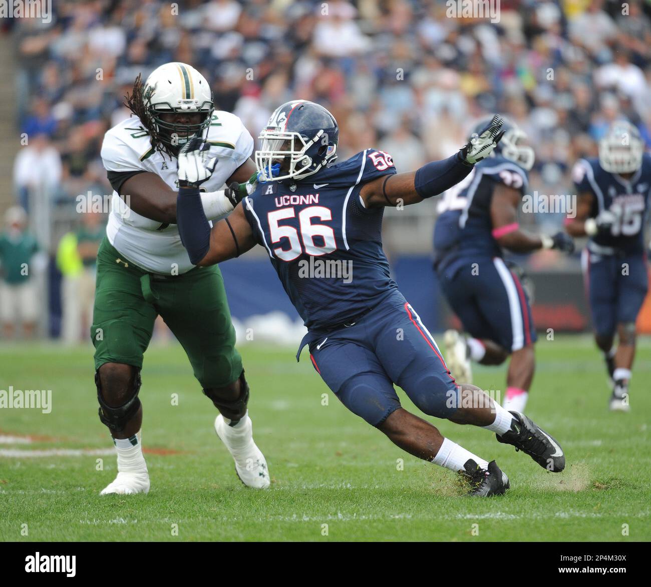 University of Connecticut Huskeys defensive lineman Angelo Pruitt (56 ...