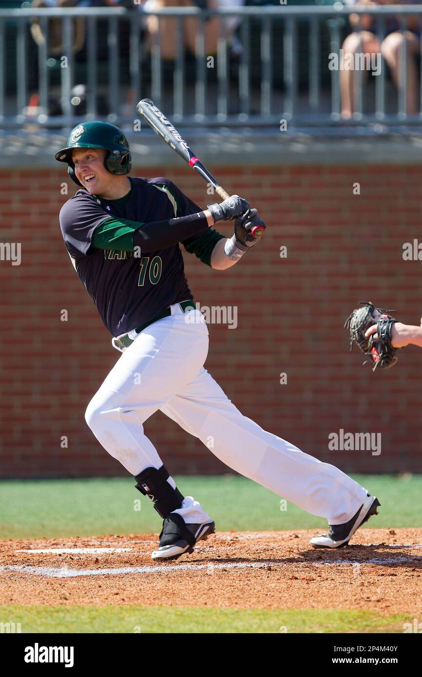 Zach Jarrett (10) of the Charlotte 49ers follows through on his swing ...