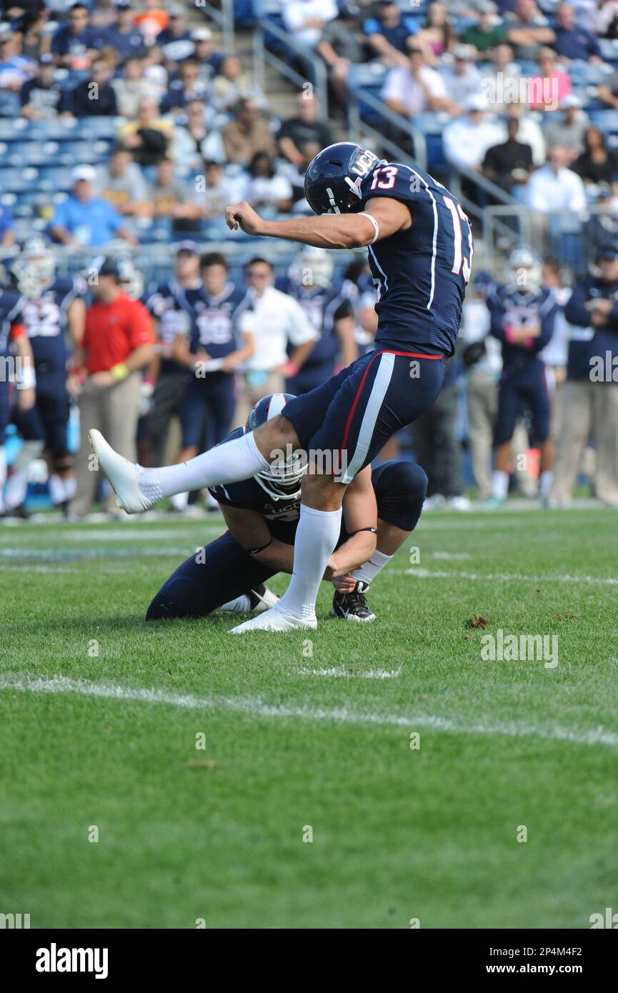 University of Connecticut Huskeys kicker Chad Christen (13) during game ...