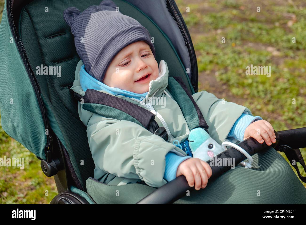 Child buggy crying hi-res stock photography and images - Alamy