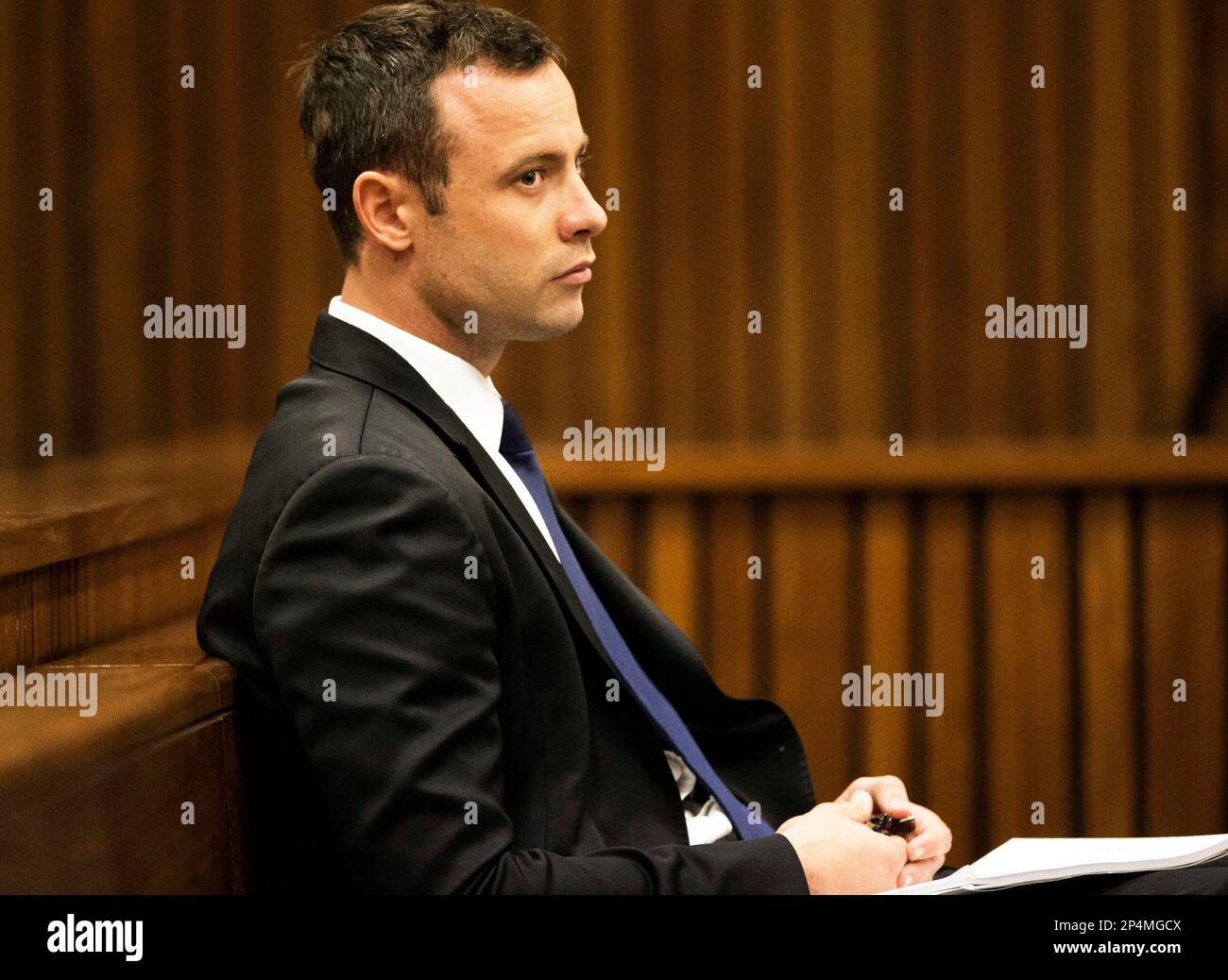 Oscar Pistorius sits in the dock during the fourth day of his trial at ...