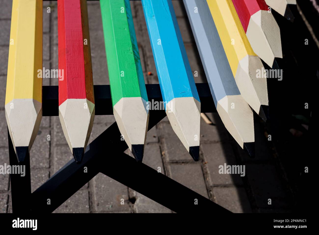 multi-colored bench for artists and children. pencil bench Stock Photo ...