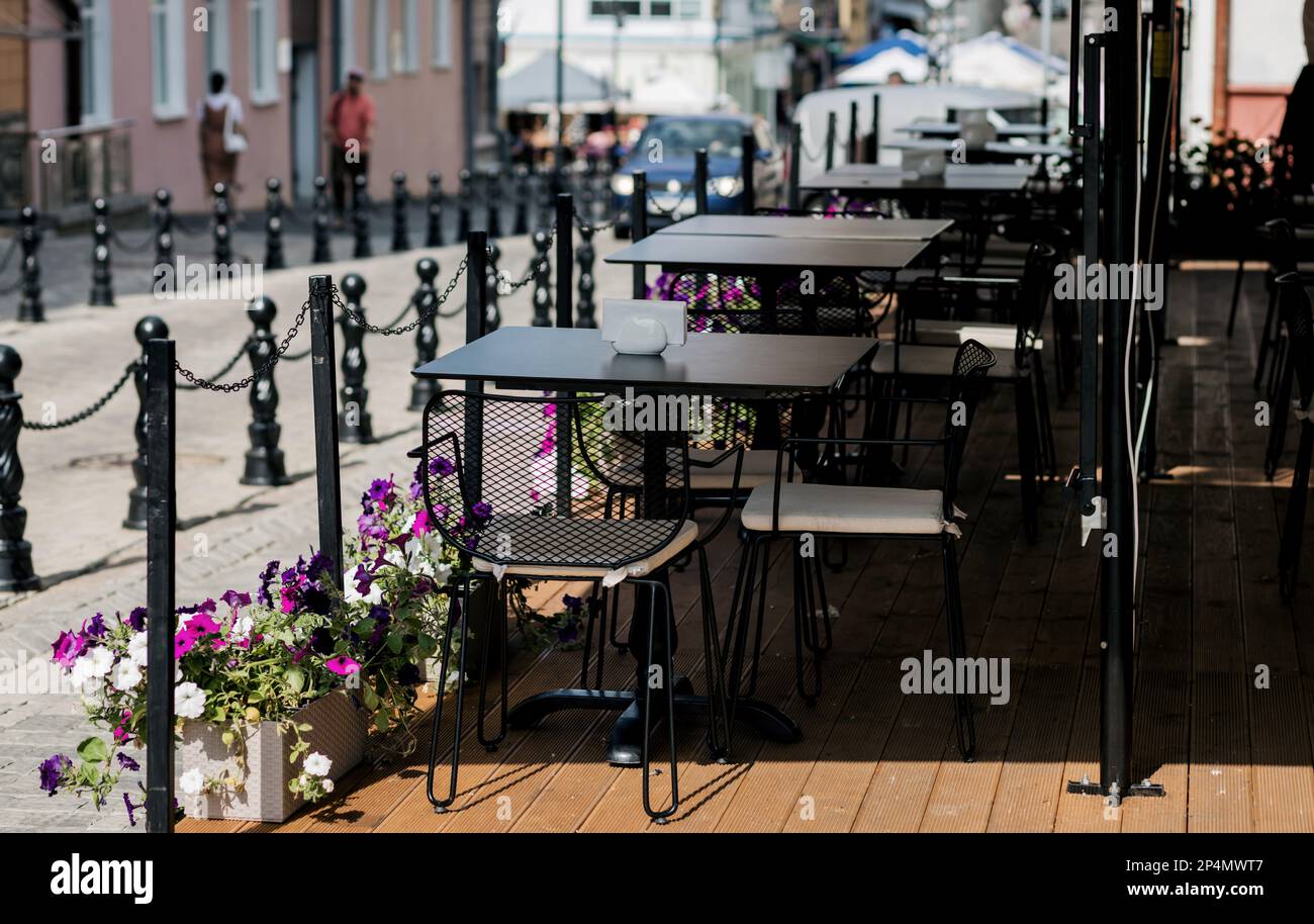 Outdoor restaurant in Europe. street cafe in summer day Stock Photo - Alamy