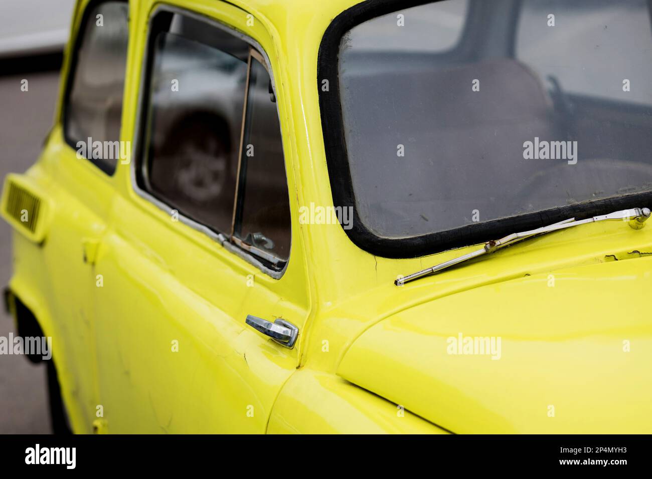 part old vintage bright yellow retro car. classic automobile Stock ...