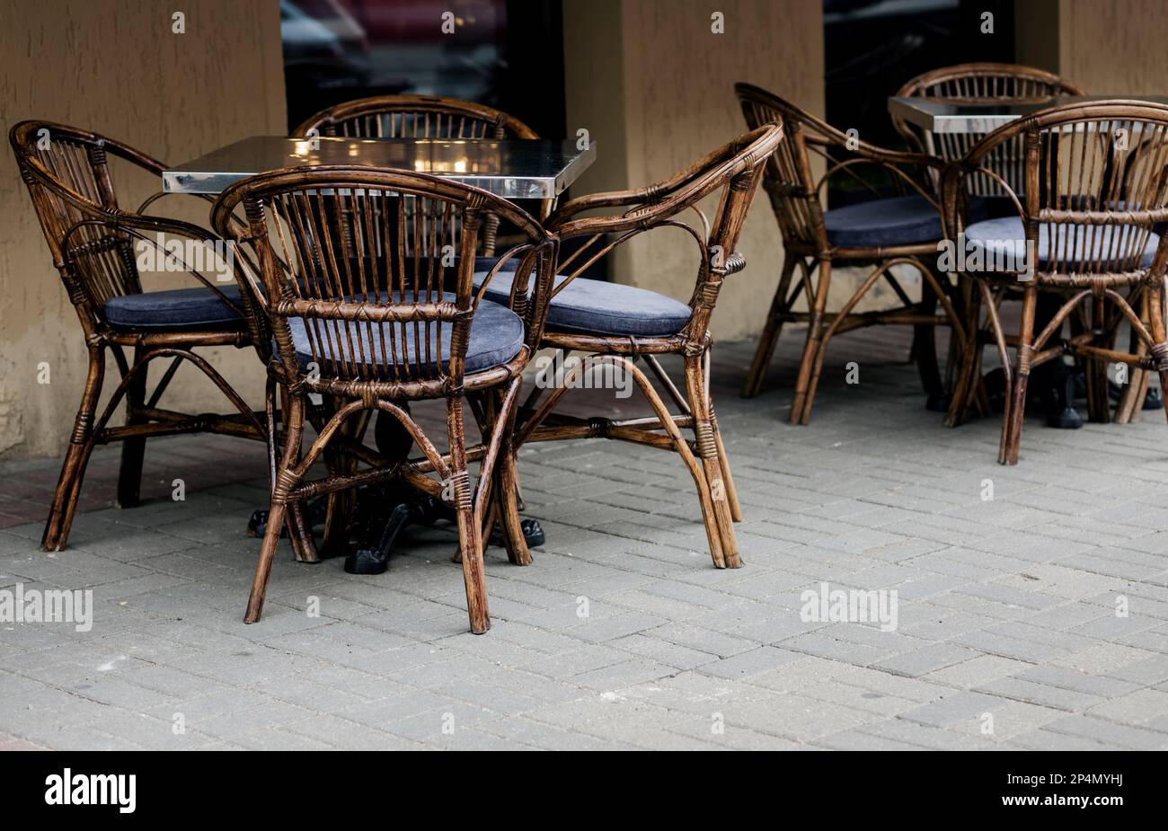 Empty Coffee shop on a sunny day. Cafe terrace in small European city ...
