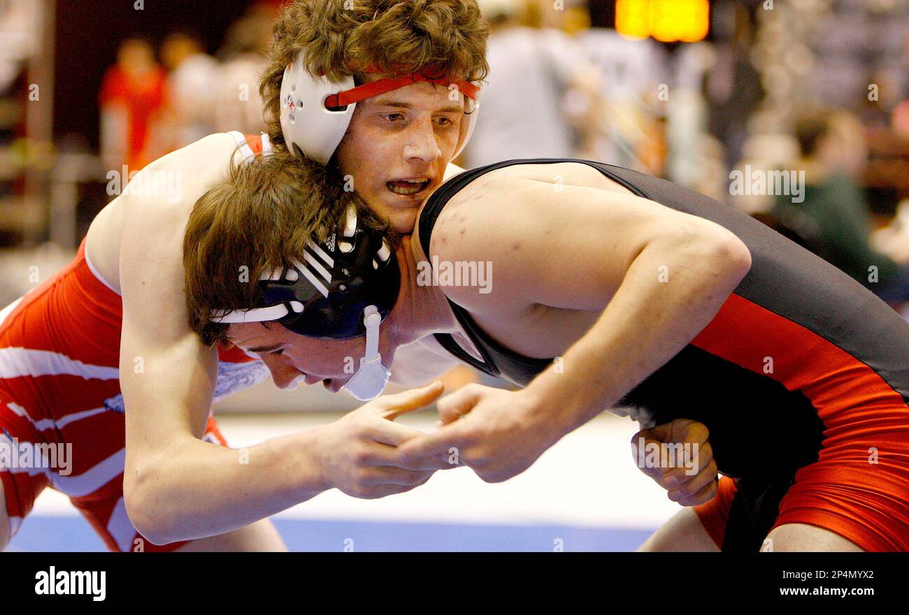 Lusk's Bryce Sturman competes against Kemmerer's Garrett Julian in the ...