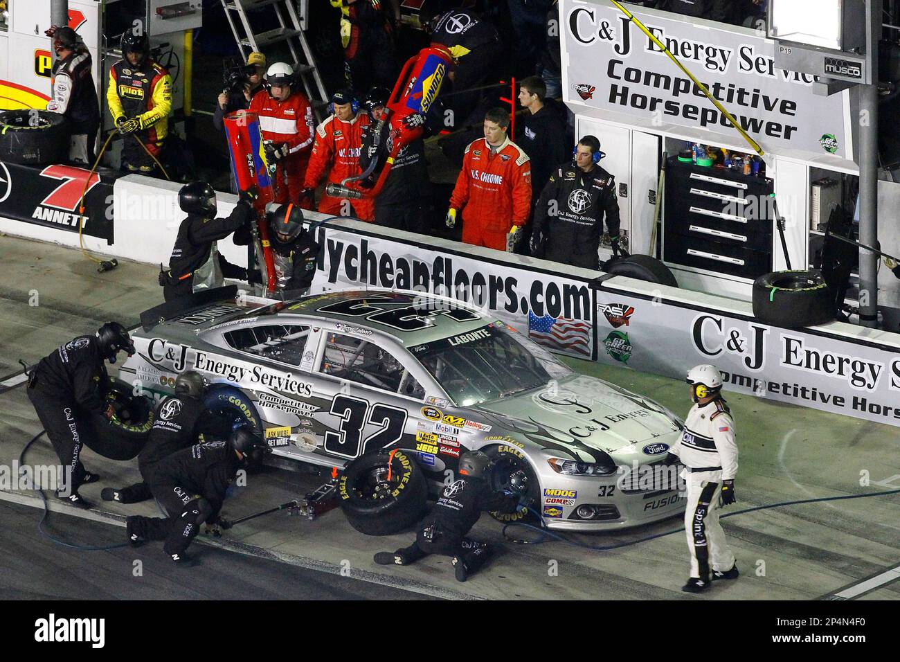 Terry Labonte, driver of the #32 C&J Energy Services Ford makes a pit ...