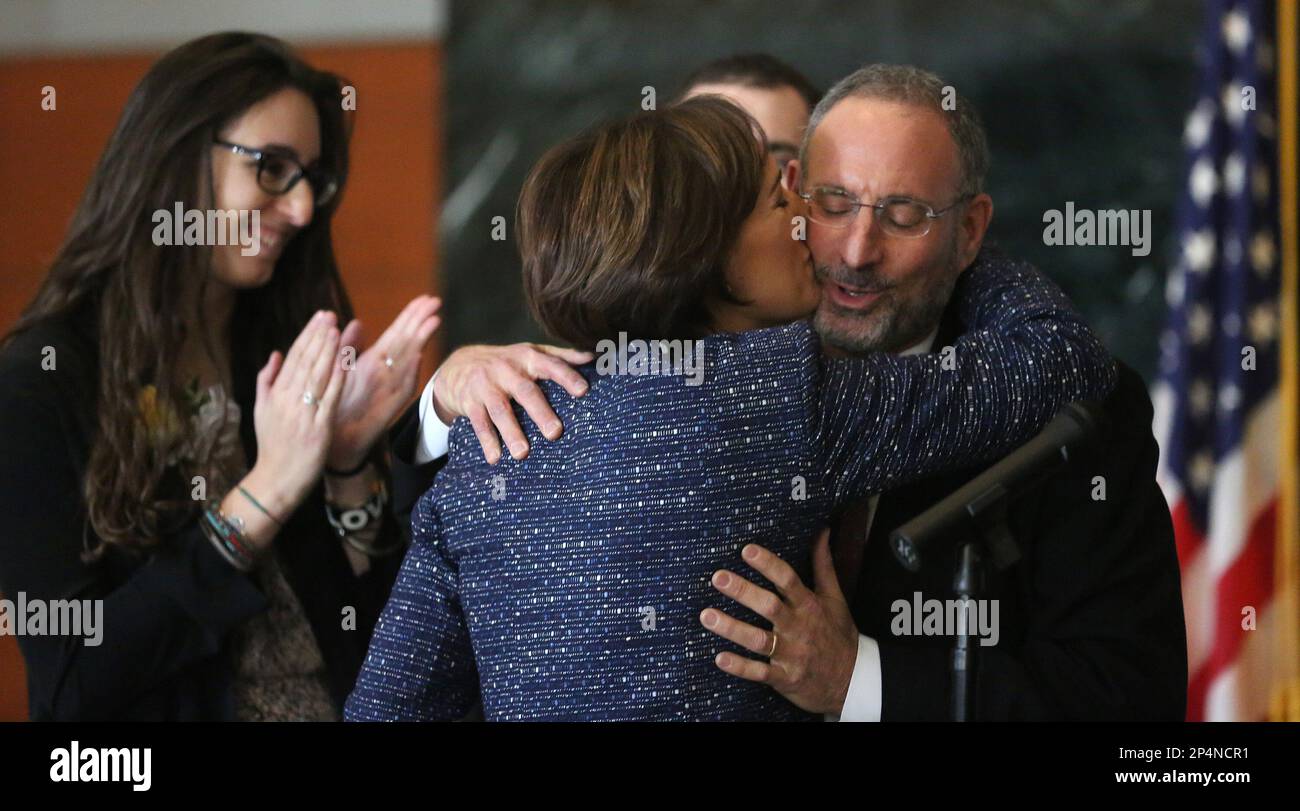 Andy Luger,got a hug from his wife, Ellen,after he was sworn in as U.S ...