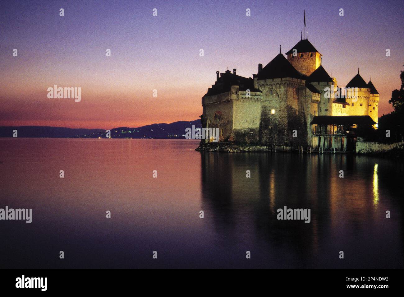 Switzerland: Châteaux Chillon at lake Geneva at sunset Stock Photo - Alamy