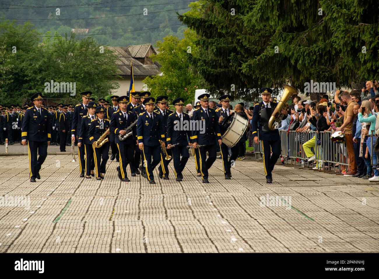 Group male musicians military uniforms playing large instruments ...