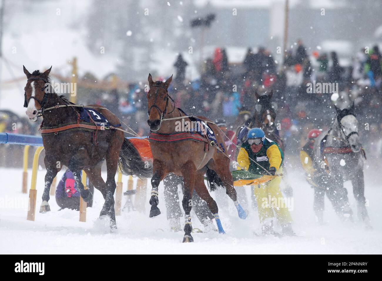 Franco Moro, pulled by Dreamspeed, center, competes during the ...