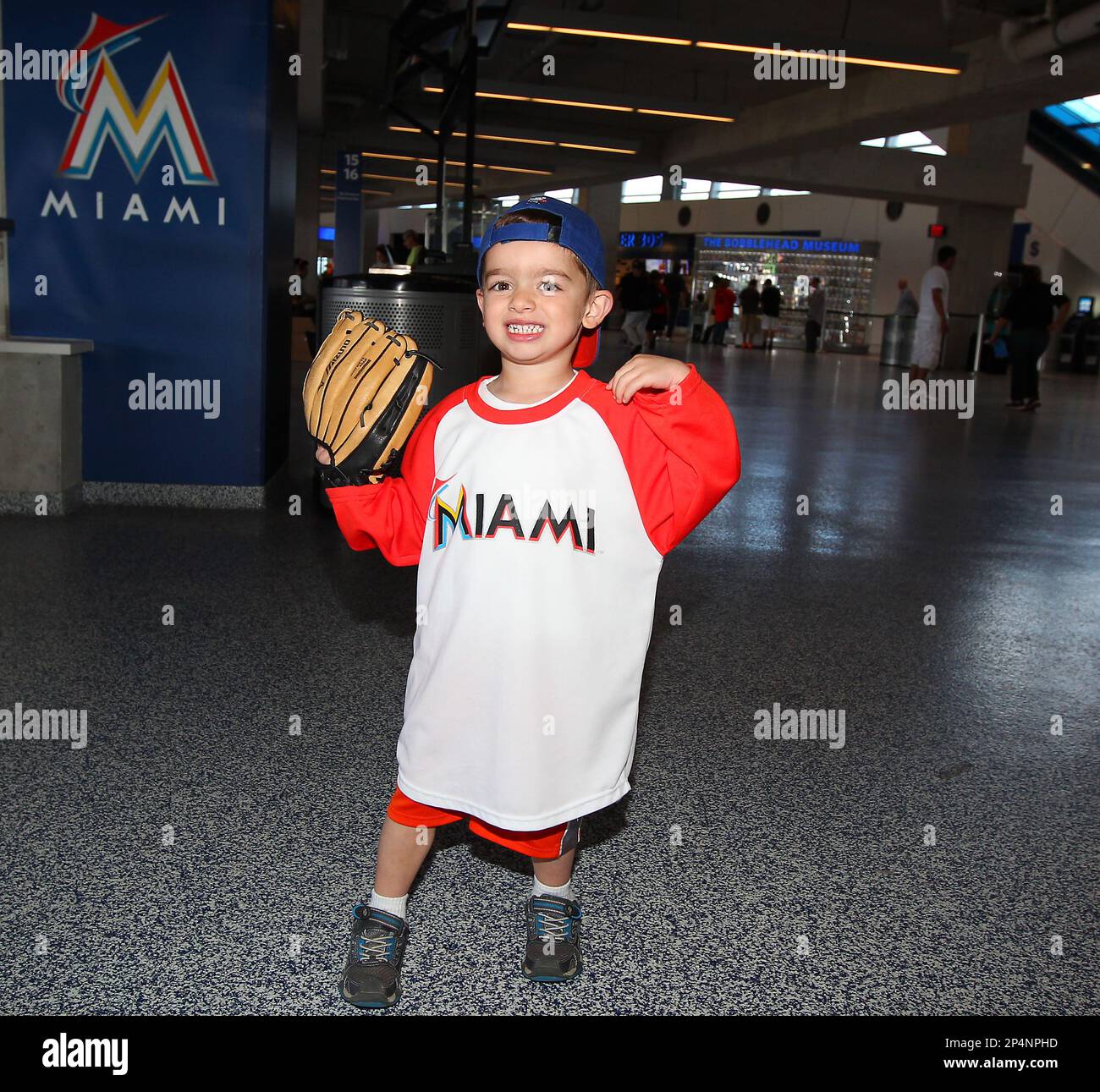 Miami Marlins fan Austin Brower, 3, poses for the picture at the ...