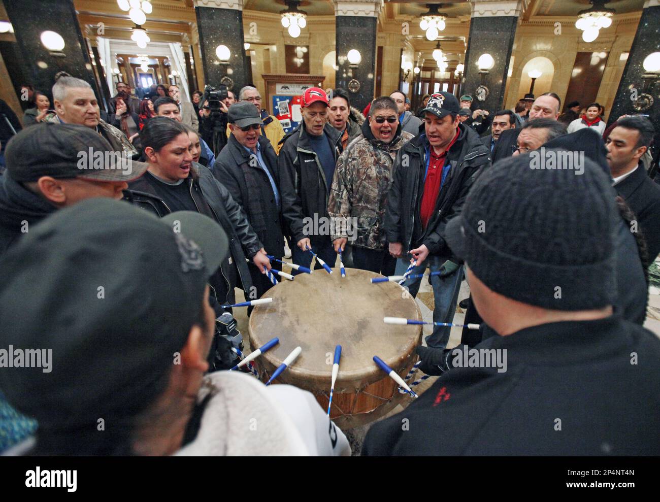 A group performs on a drum in the rotunda before the State of the ...