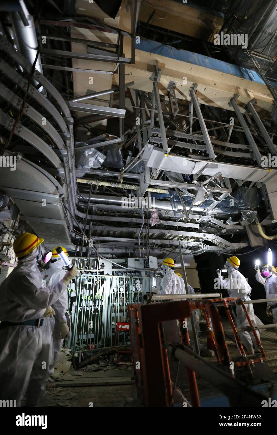Wreckage is seen inside the containment vessel at the No. 4 reactor of ...