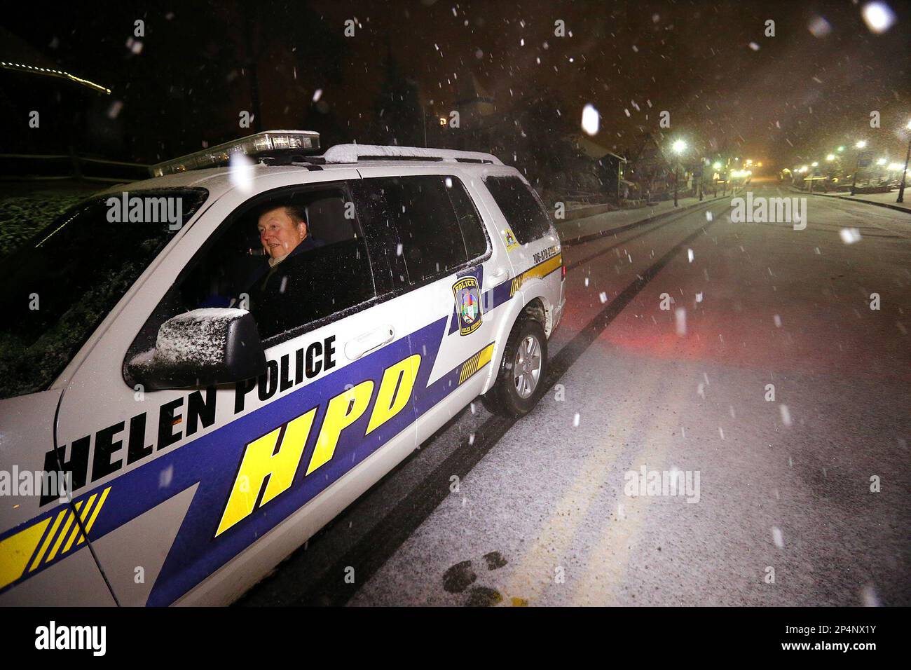 Helen police officer Lee Johannsen in his four wheel drive vehicle is ...