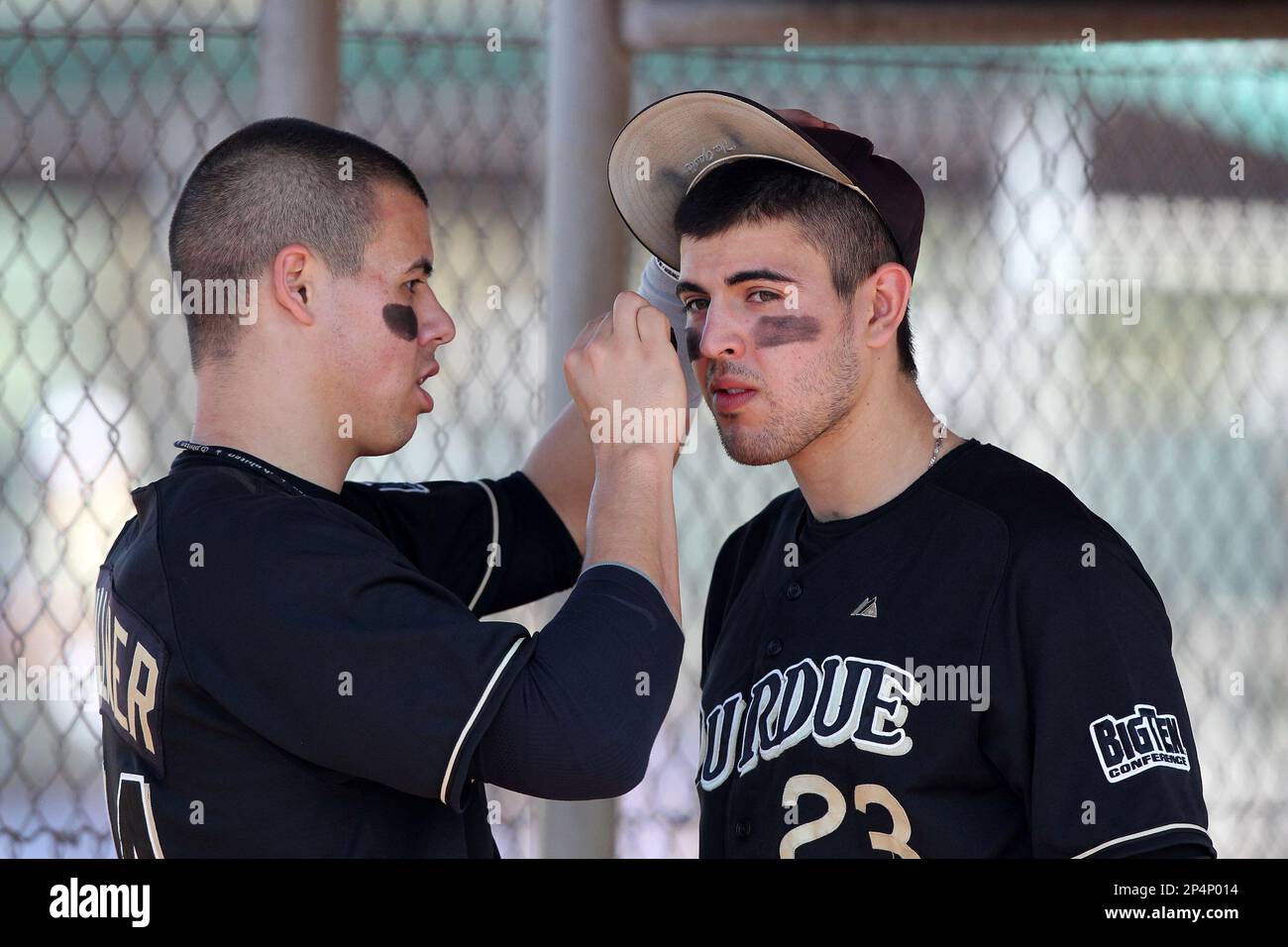 Barrett Serrato #23 of the Purdue Boilermakers gets help putting on eye ...