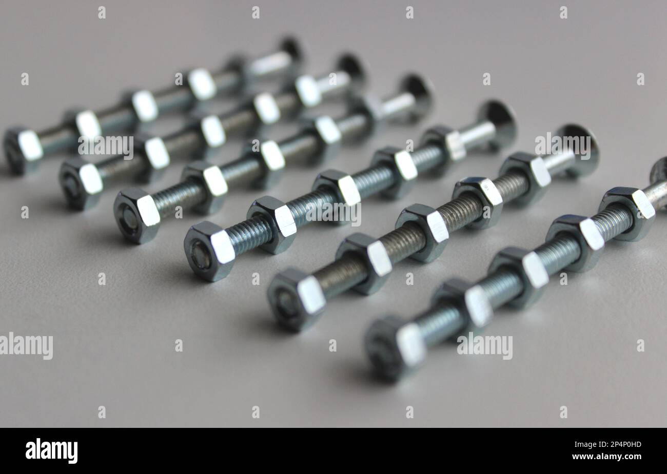 Hex Nuts On A Threaded Hex Bolts Angle View With Soft Focus Stock Photo ...