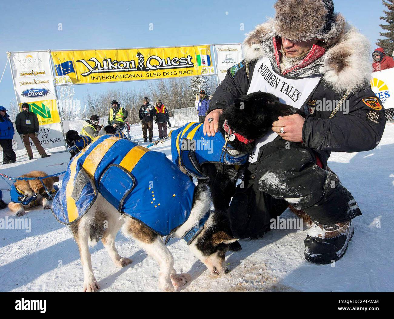 Alaska resident Hugh Neff poses with his dogs Jewel, left, and Bodhi ...