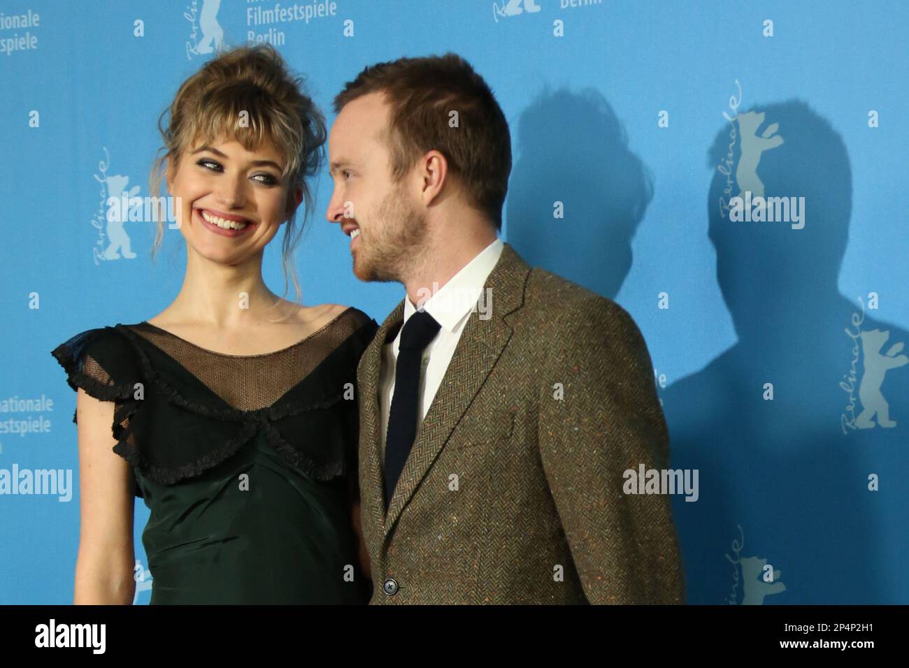 Actors Imogen Poots and Aaron Paul pose for photographers at the photo ...