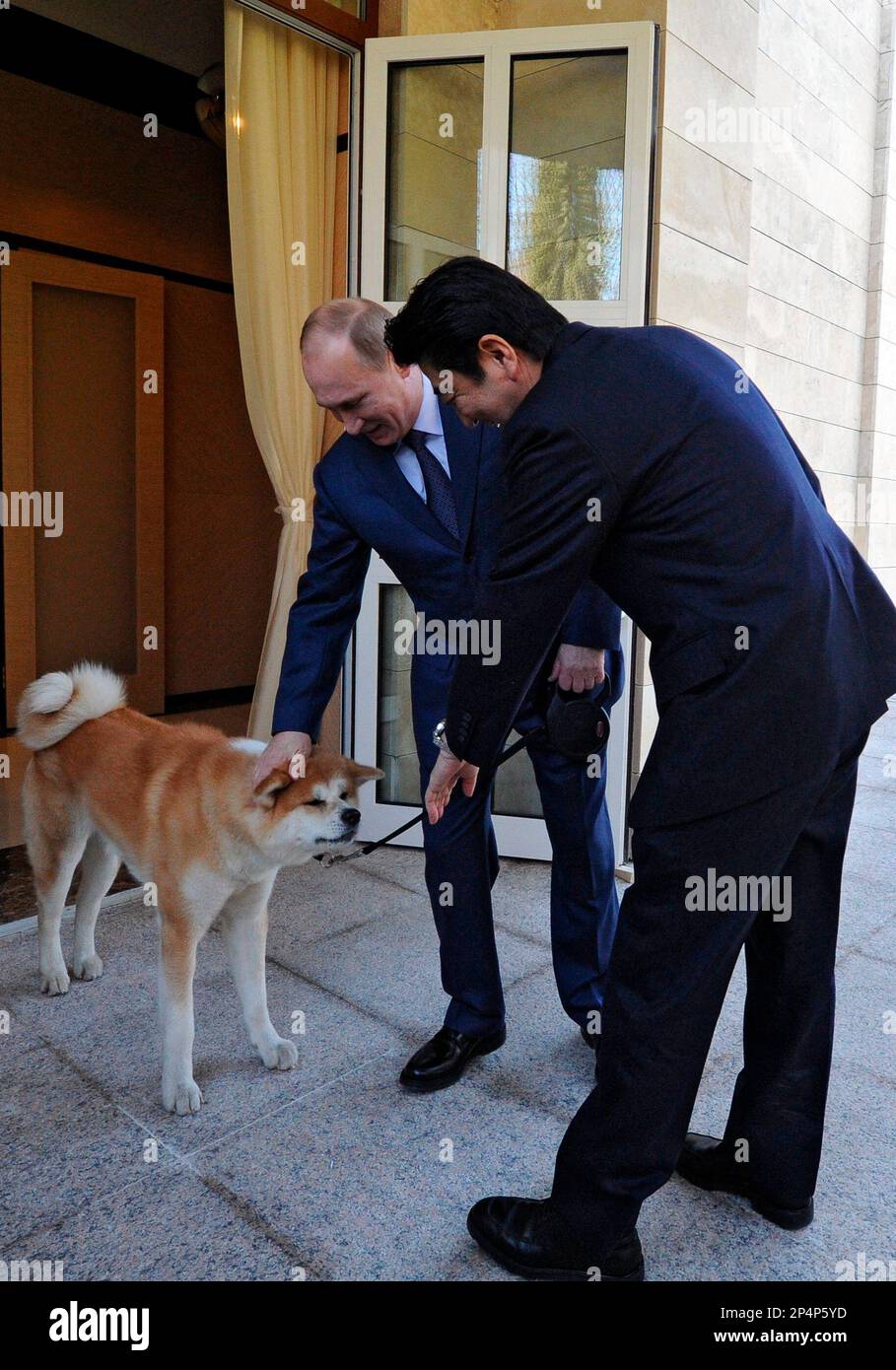 Russian President Vladimir Putin and Japanese Prime Minister Shinzo Abe ...