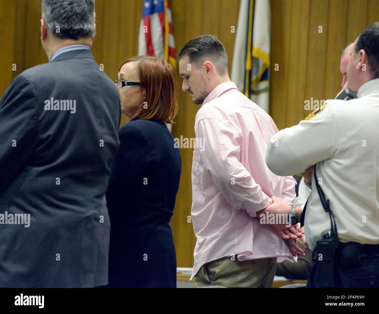 Adam Lee Hall, center, is handcuffed after the first guilty verdict is ...