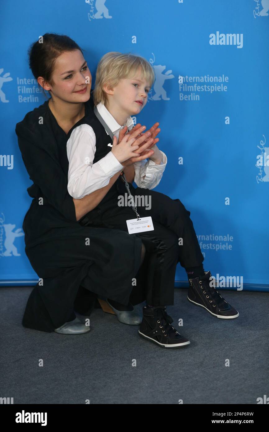 Actress Luise Heyer holds actor Georg Arms as they pose for ...